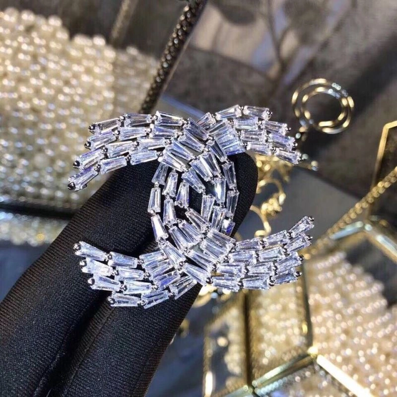Cut-rate Chanel Brooches