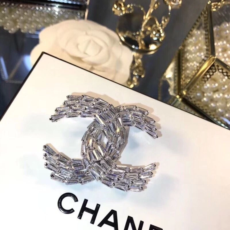 Cut-rate Chanel Brooches