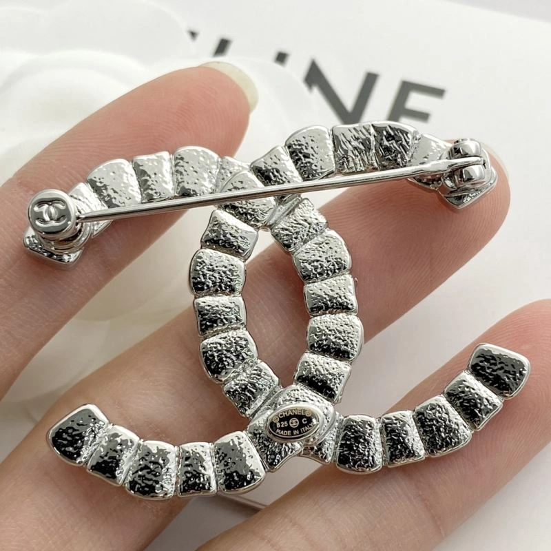Reasonably priced Chanel Brooches