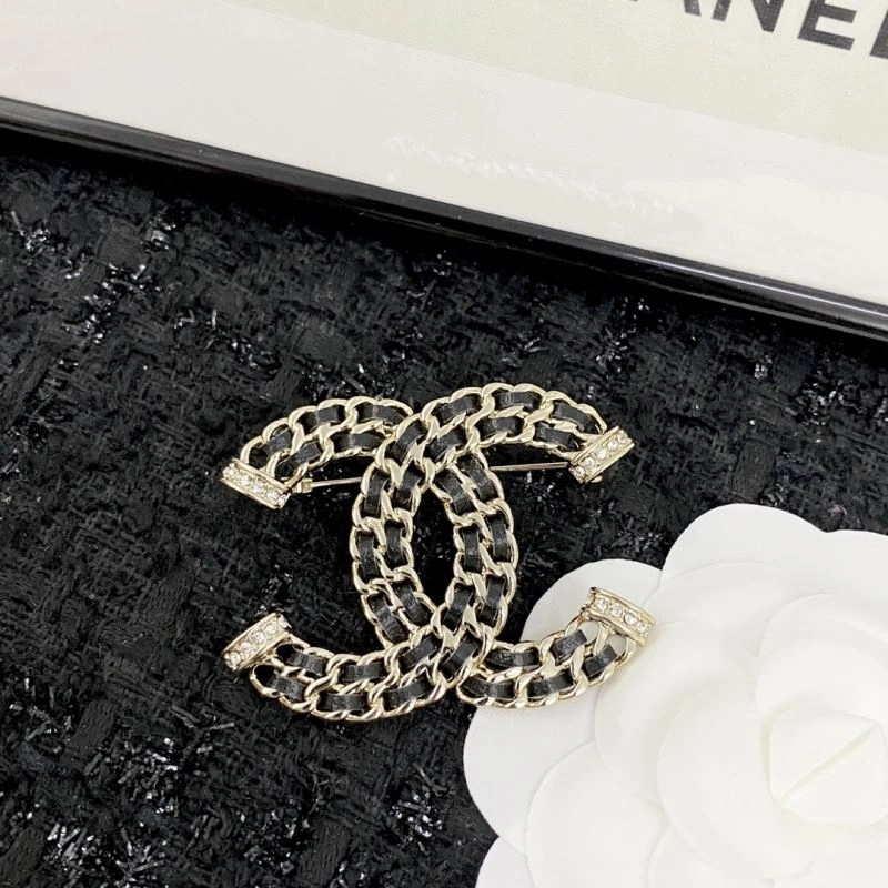 Indistinguishable Chanel Brooches