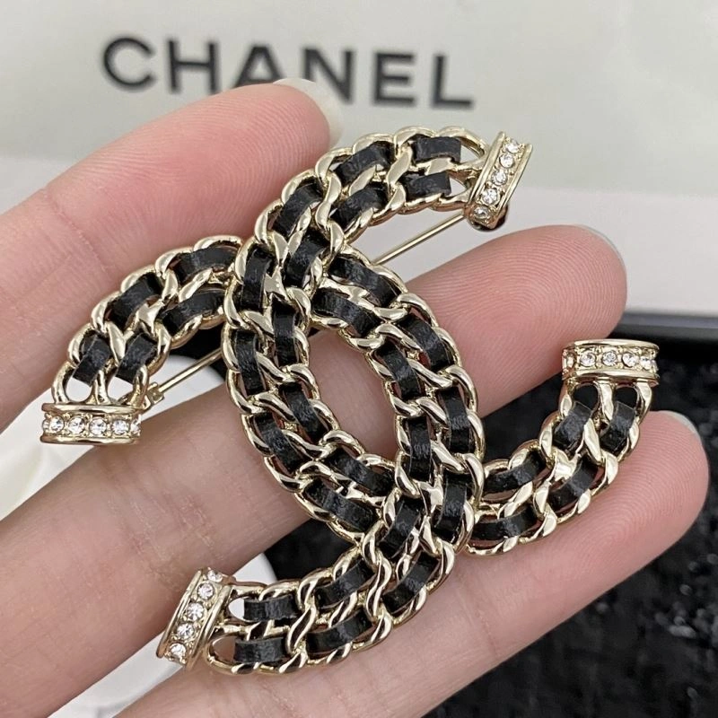 Indistinguishable Chanel Brooches