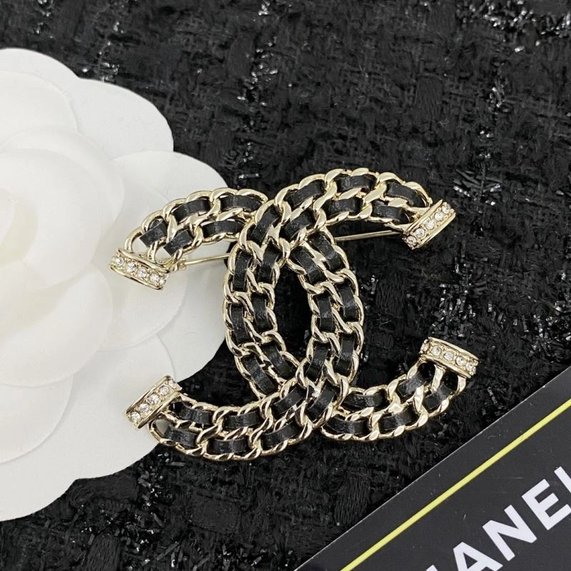 Indistinguishable Chanel Brooches