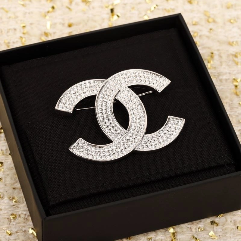 Indistinguishable Chanel Brooches