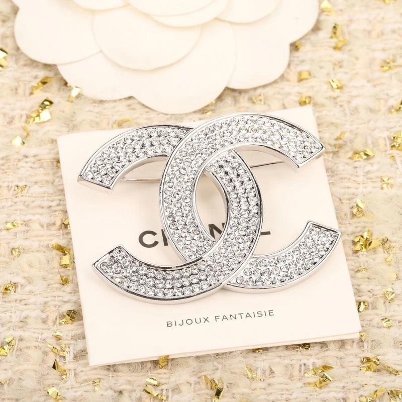 Indistinguishable Chanel Brooches