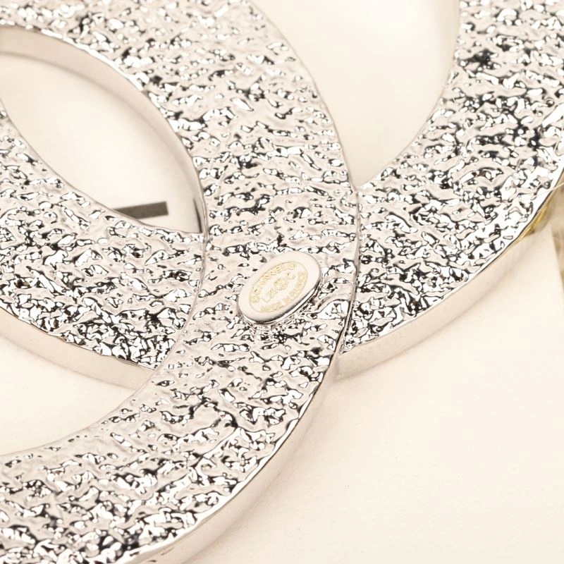 Indistinguishable Chanel Brooches