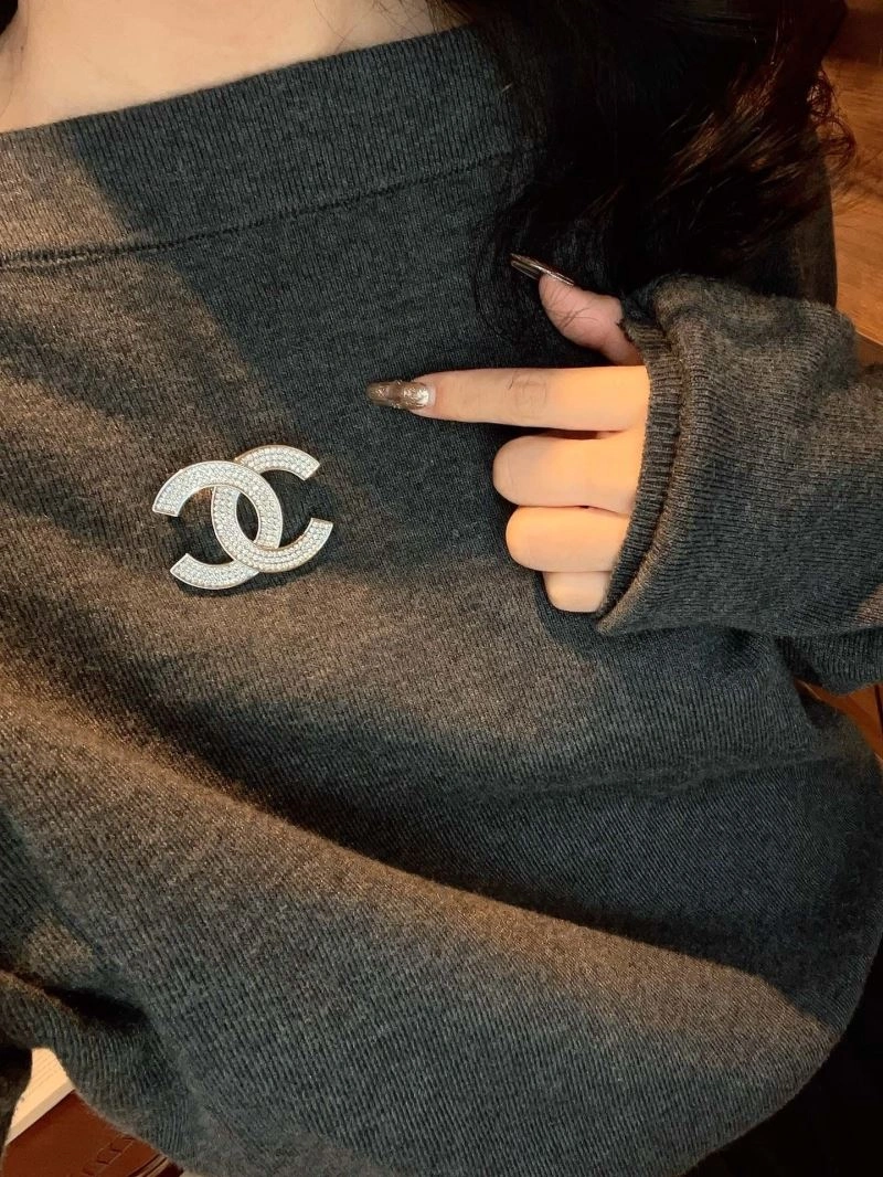 Indistinguishable Chanel Brooches