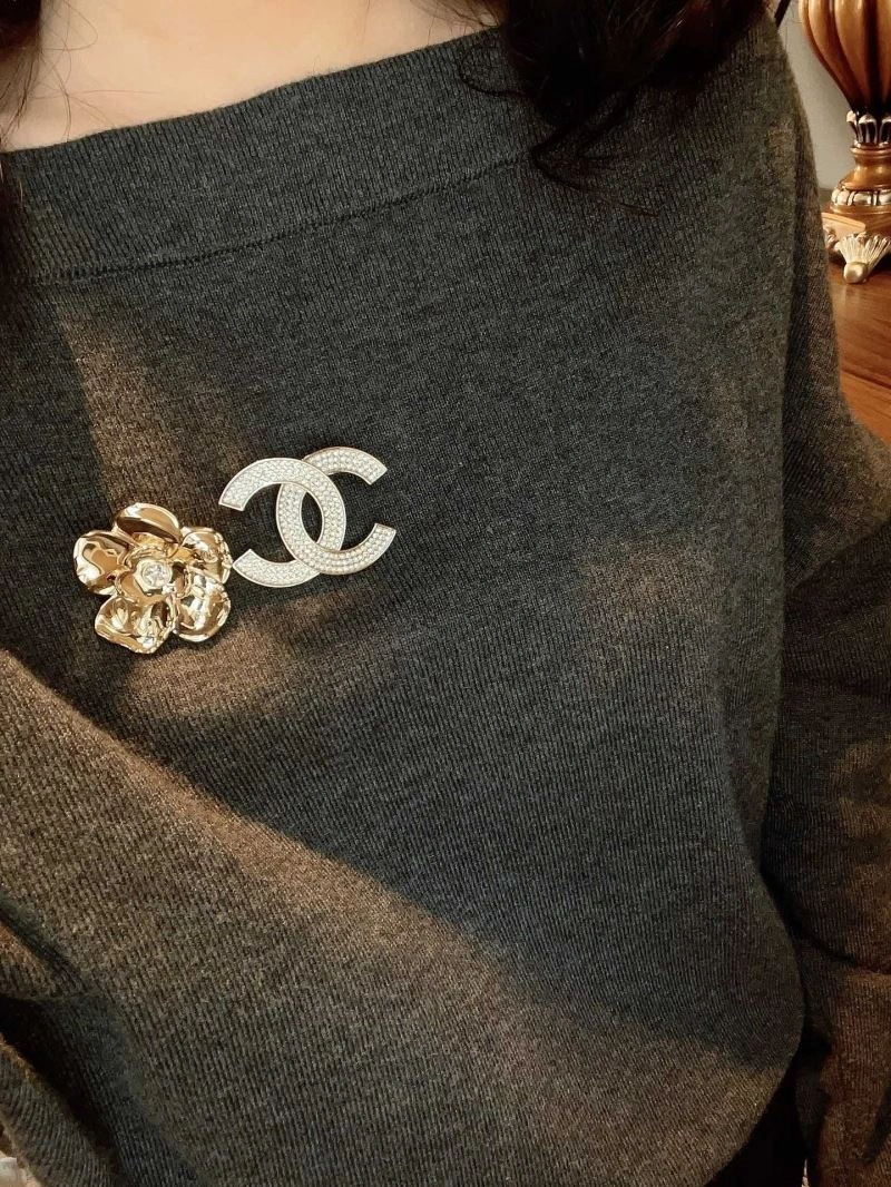 Indistinguishable Chanel Brooches