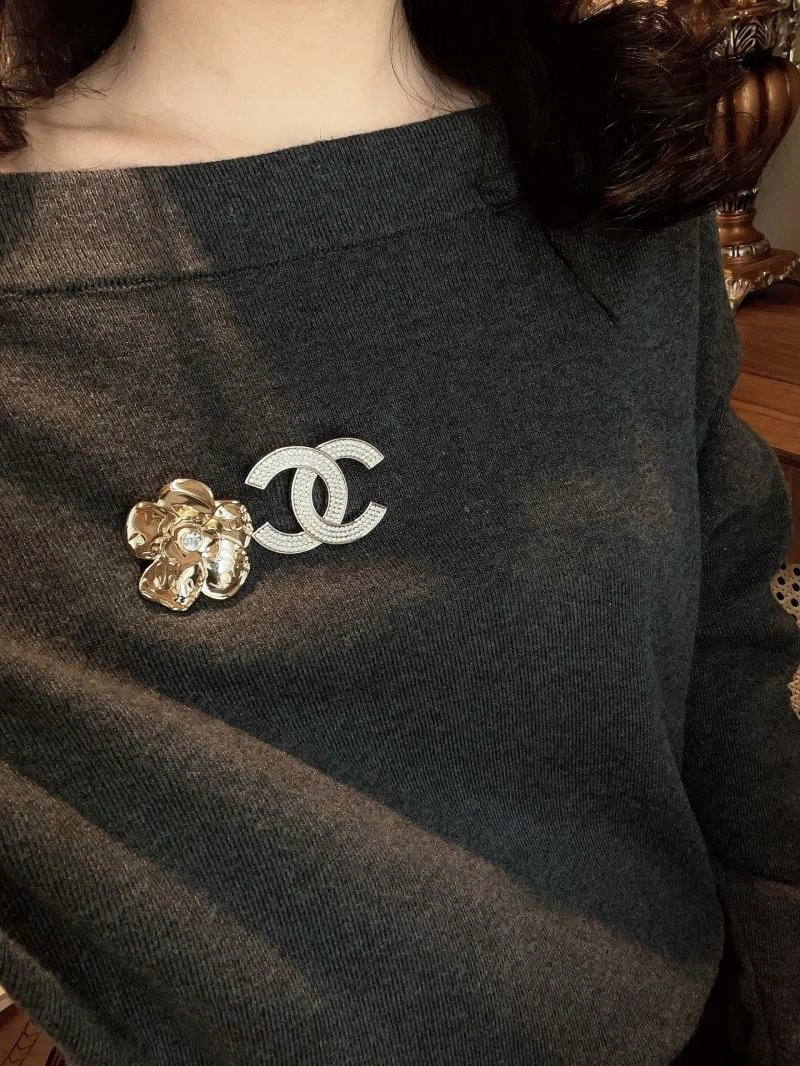 Indistinguishable Chanel Brooches