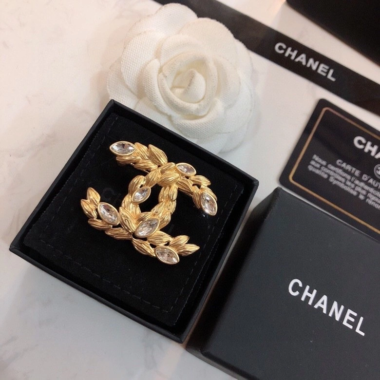 Indistinguishable Chanel Brooches