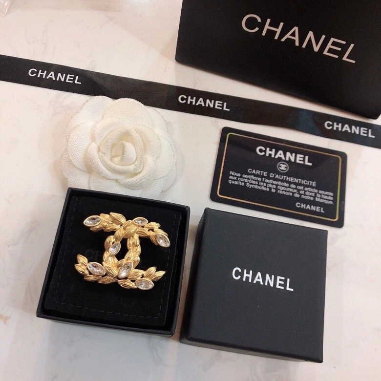 Indistinguishable Chanel Brooches