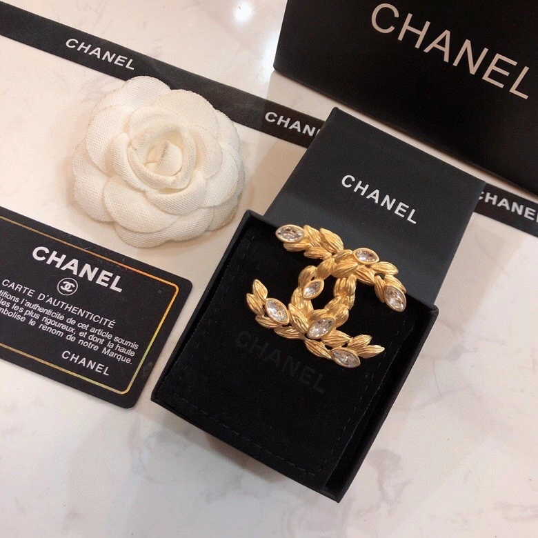 Indistinguishable Chanel Brooches