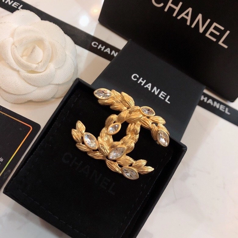 Indistinguishable Chanel Brooches