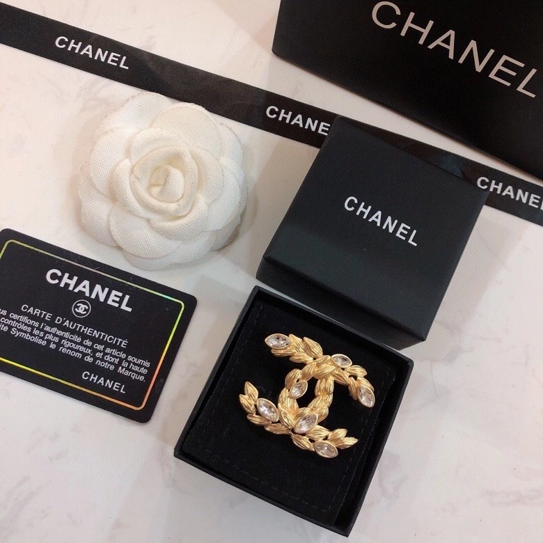 Indistinguishable Chanel Brooches