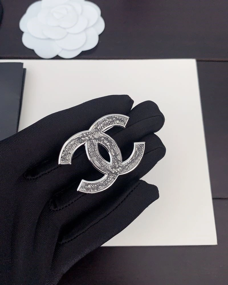 Indistinguishable Chanel Brooches