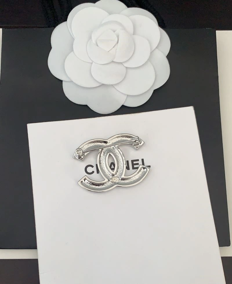 Indistinguishable Chanel Brooches