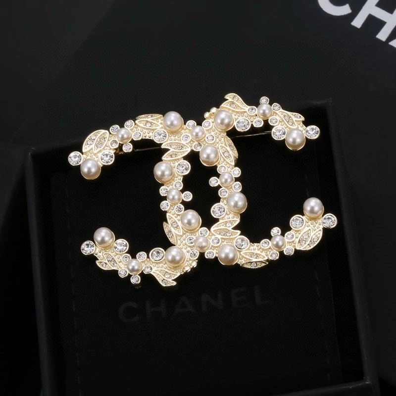 Indistinguishable Chanel Brooches