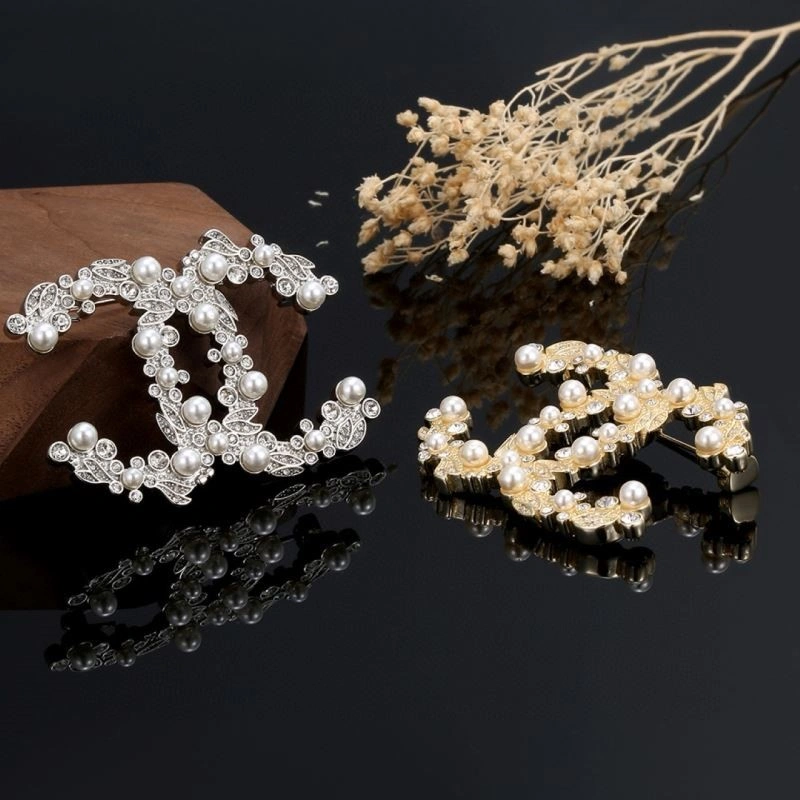Indistinguishable Chanel Brooches