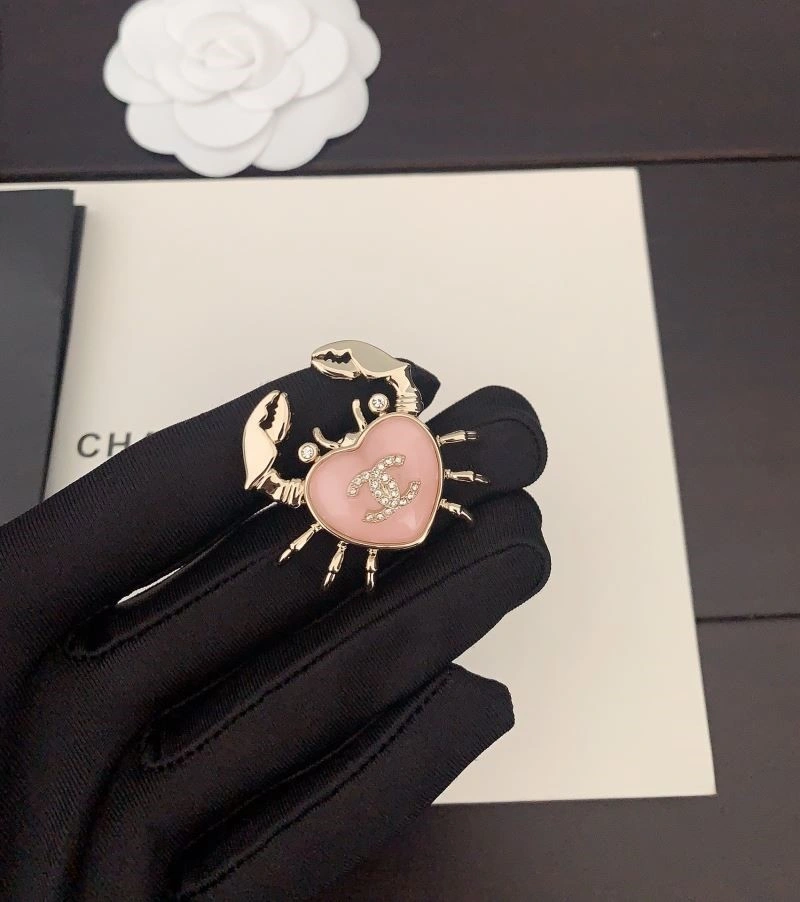 Indistinguishable Chanel Brooches