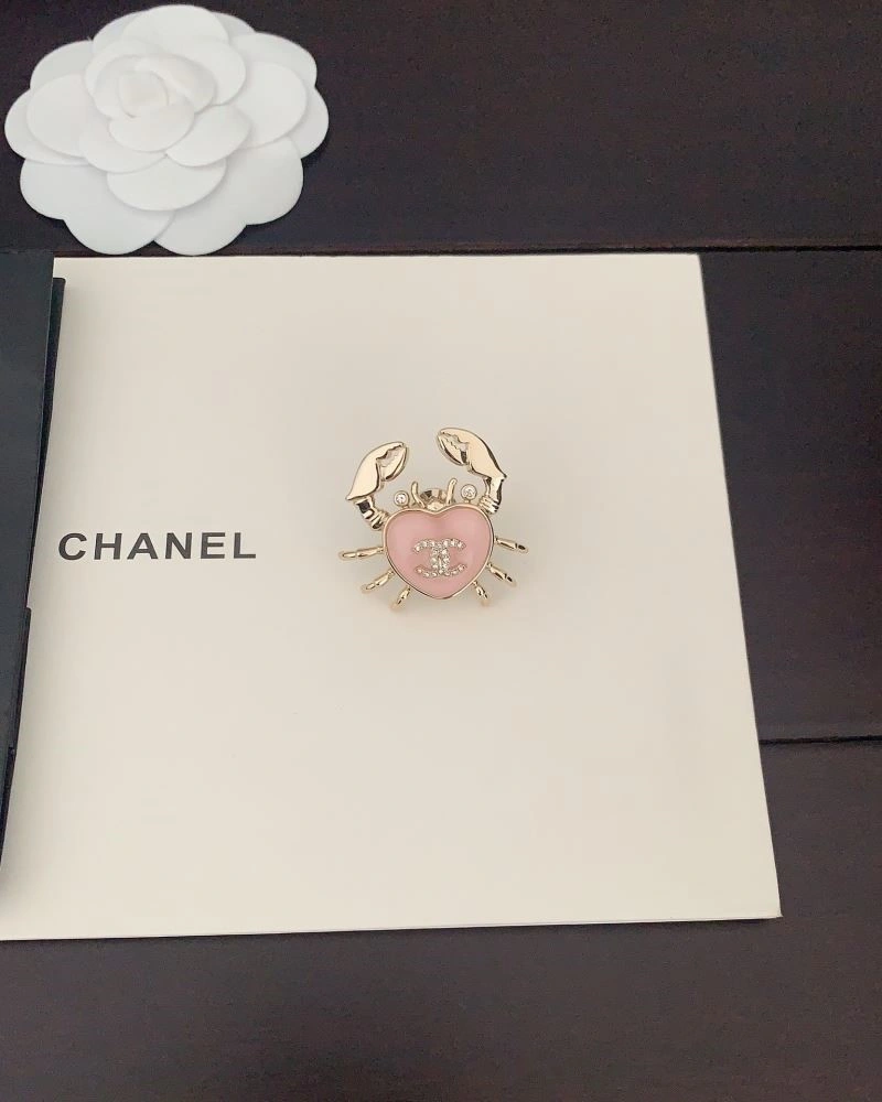 Indistinguishable Chanel Brooches