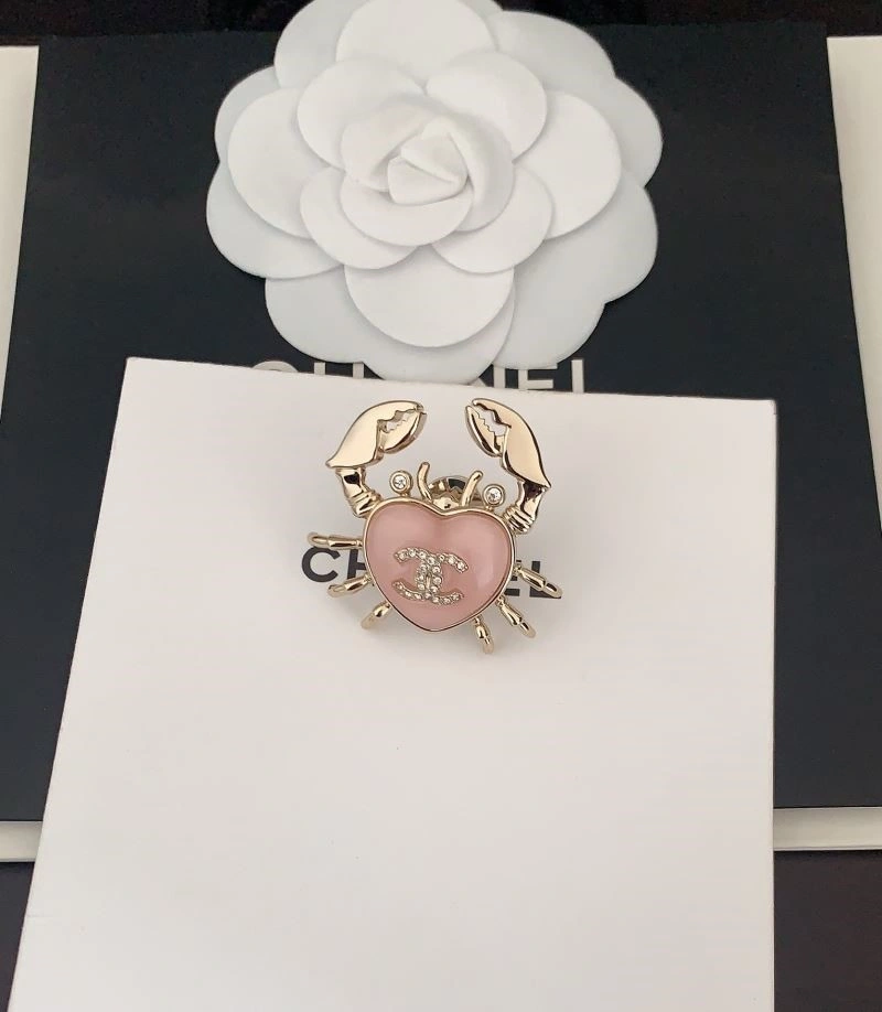 Indistinguishable Chanel Brooches