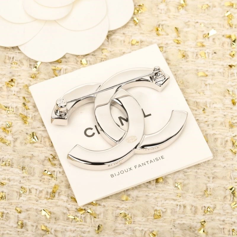 Cut-rate Chanel Brooches