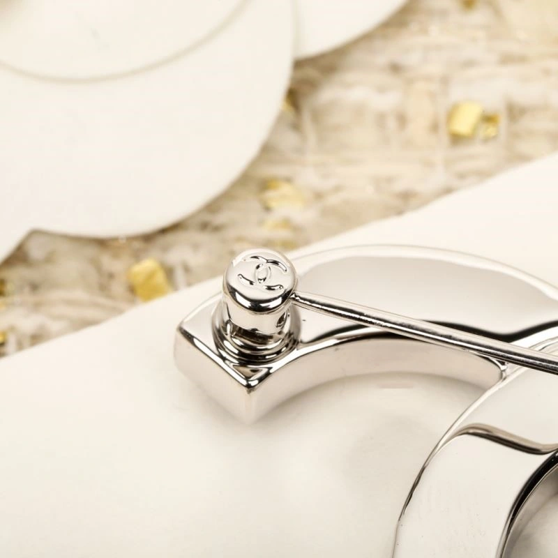 Cut-rate Chanel Brooches
