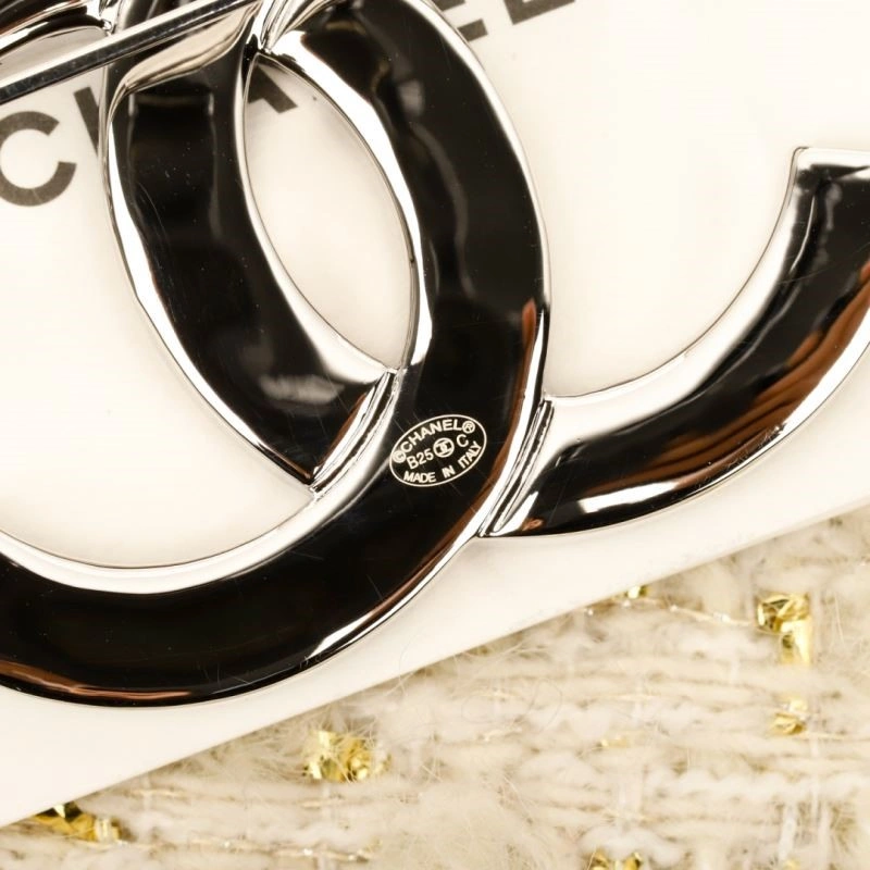 Cut-rate Chanel Brooches