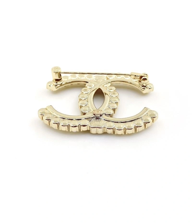 Cut-rate Chanel Brooches