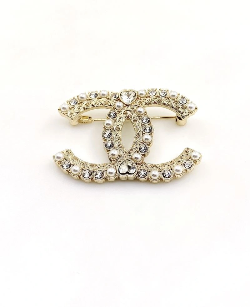 Cut-rate Chanel Brooches