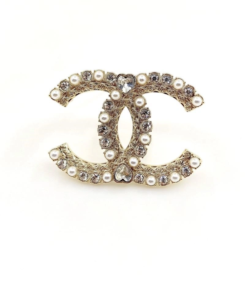 Cut-rate Chanel Brooches
