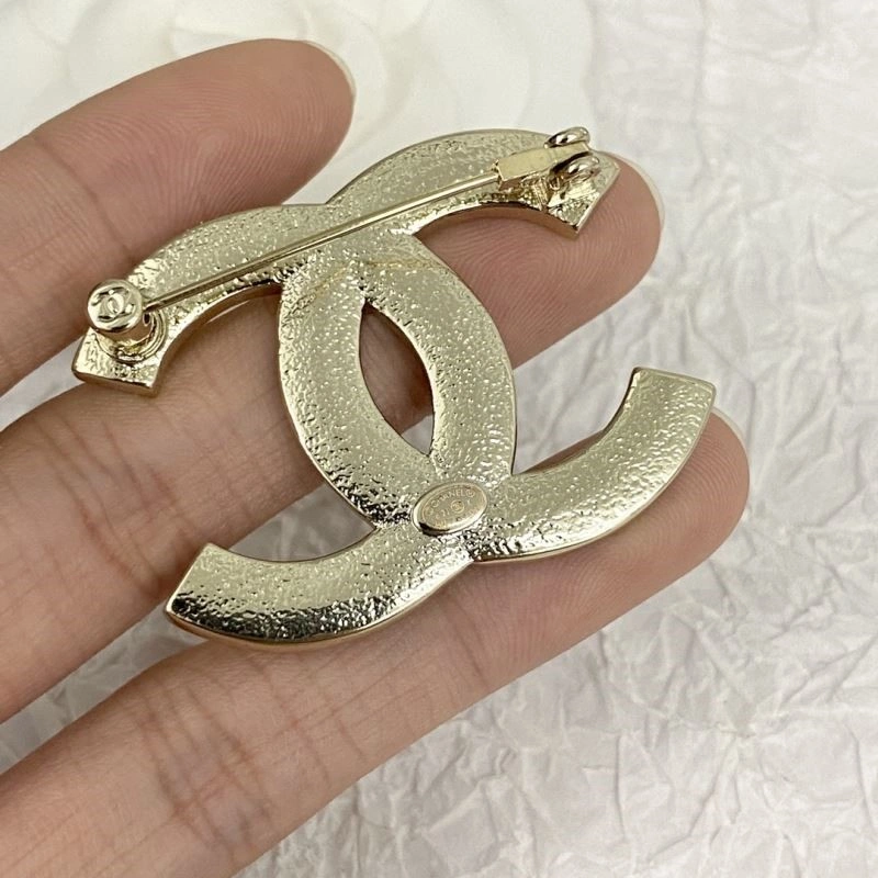 Cut-rate Chanel Brooches