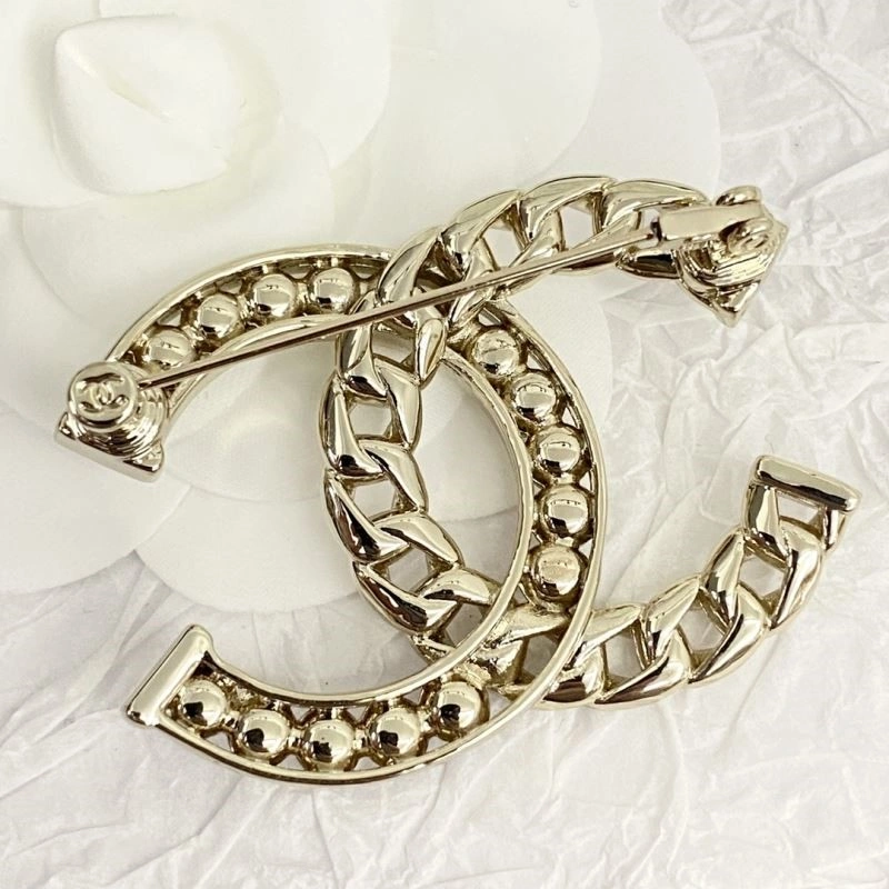 Cut-rate Chanel Brooches