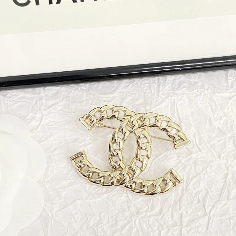 Cut-rate Chanel Brooches
