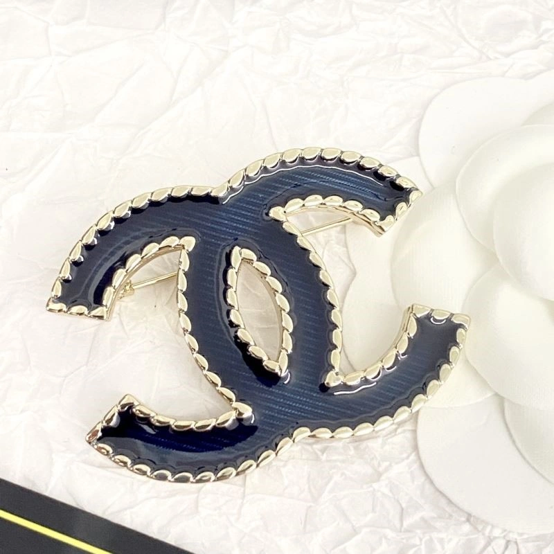 Reasonably priced Chanel Brooches