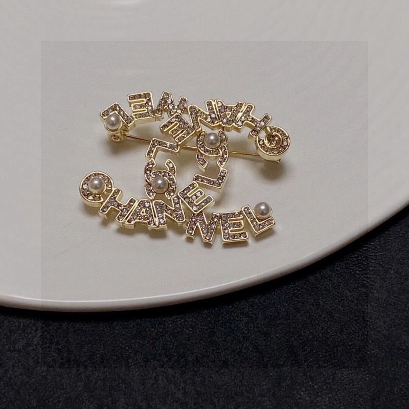 Indistinguishable Chanel Brooches