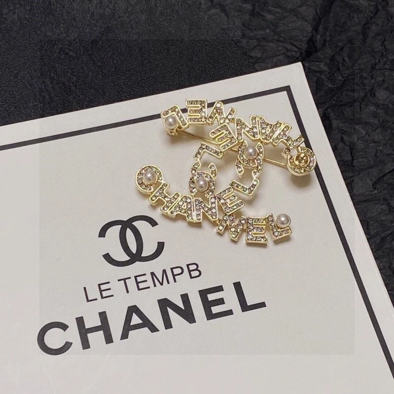 Indistinguishable Chanel Brooches
