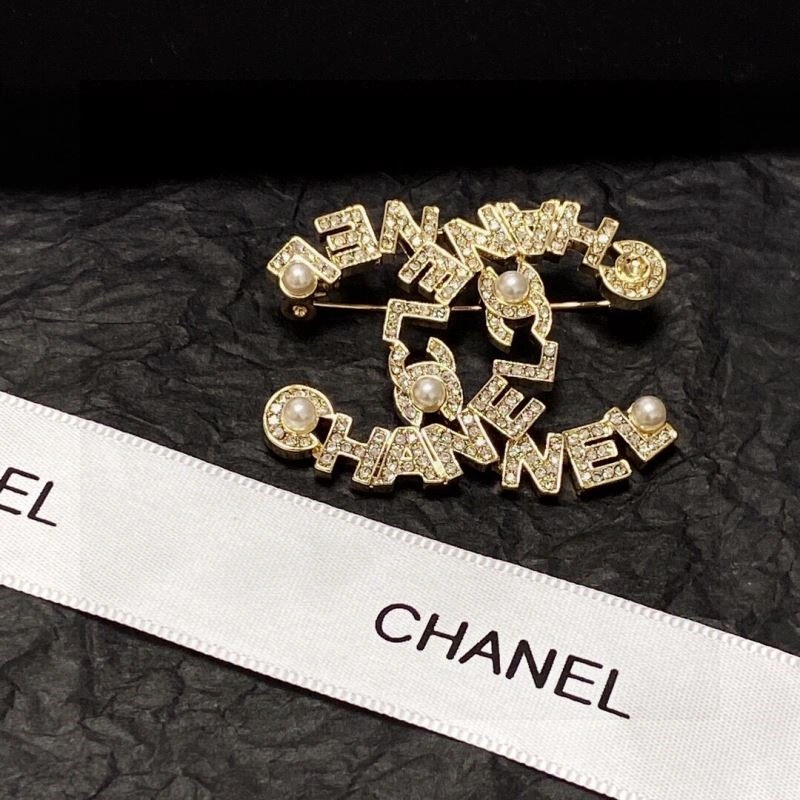 Indistinguishable Chanel Brooches