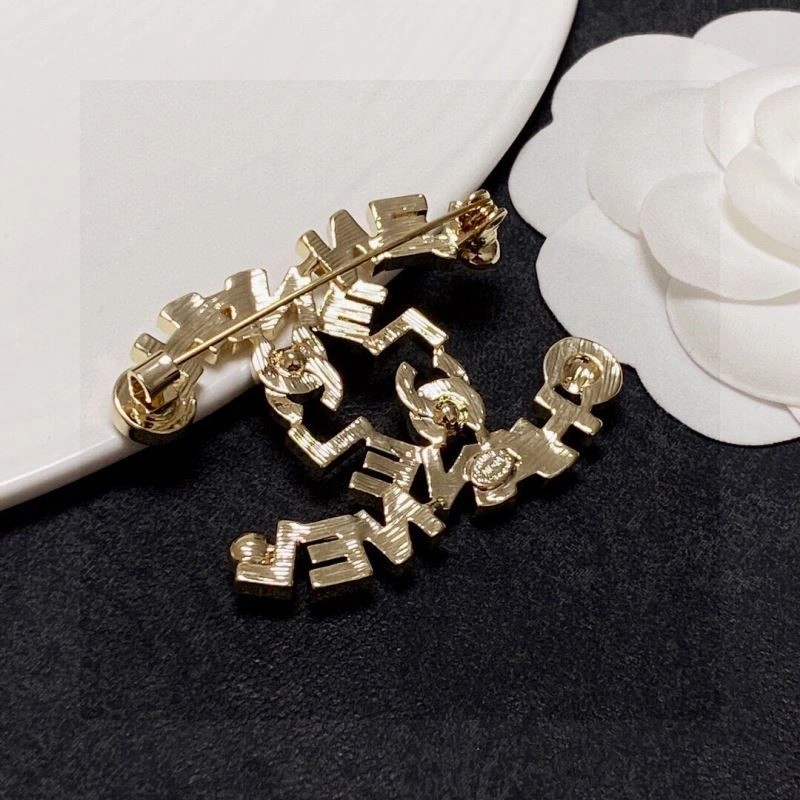 Indistinguishable Chanel Brooches