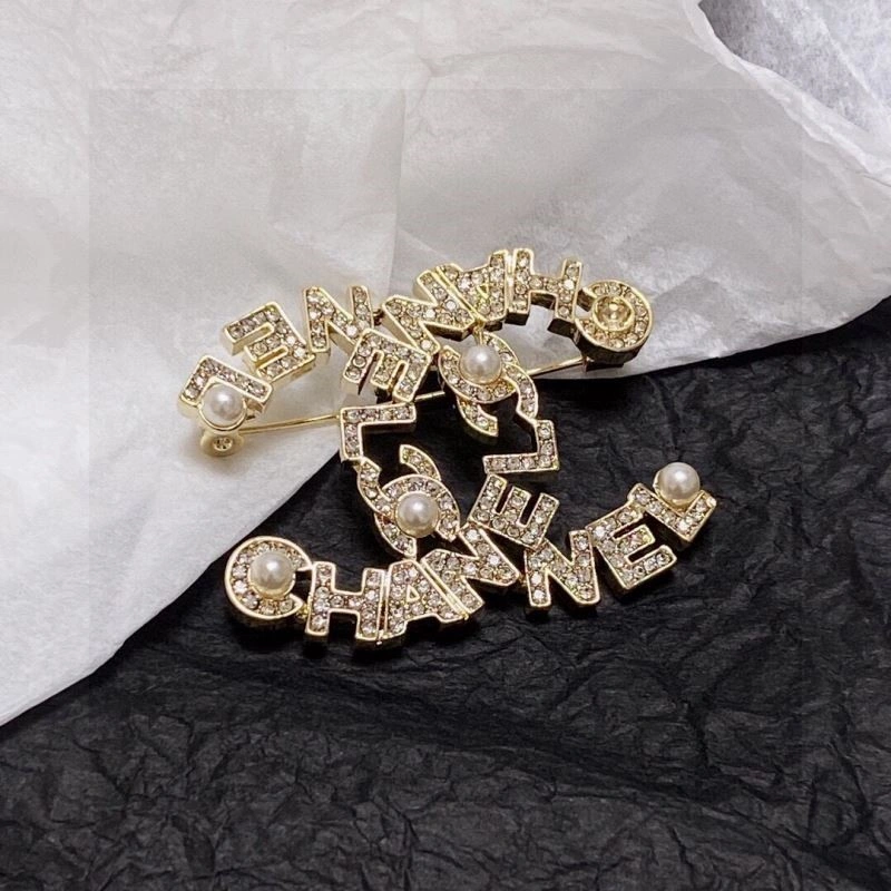Indistinguishable Chanel Brooches