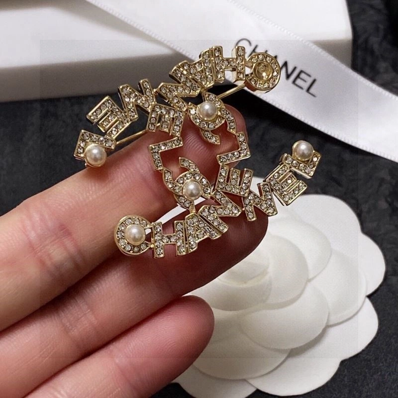 Indistinguishable Chanel Brooches