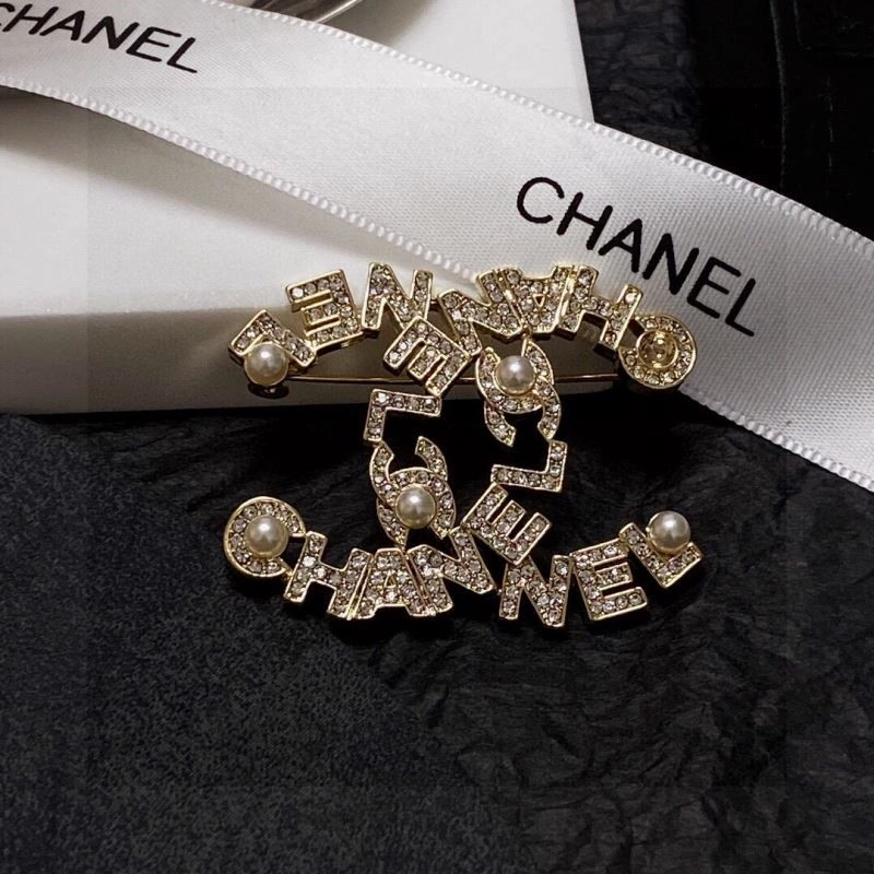 Indistinguishable Chanel Brooches