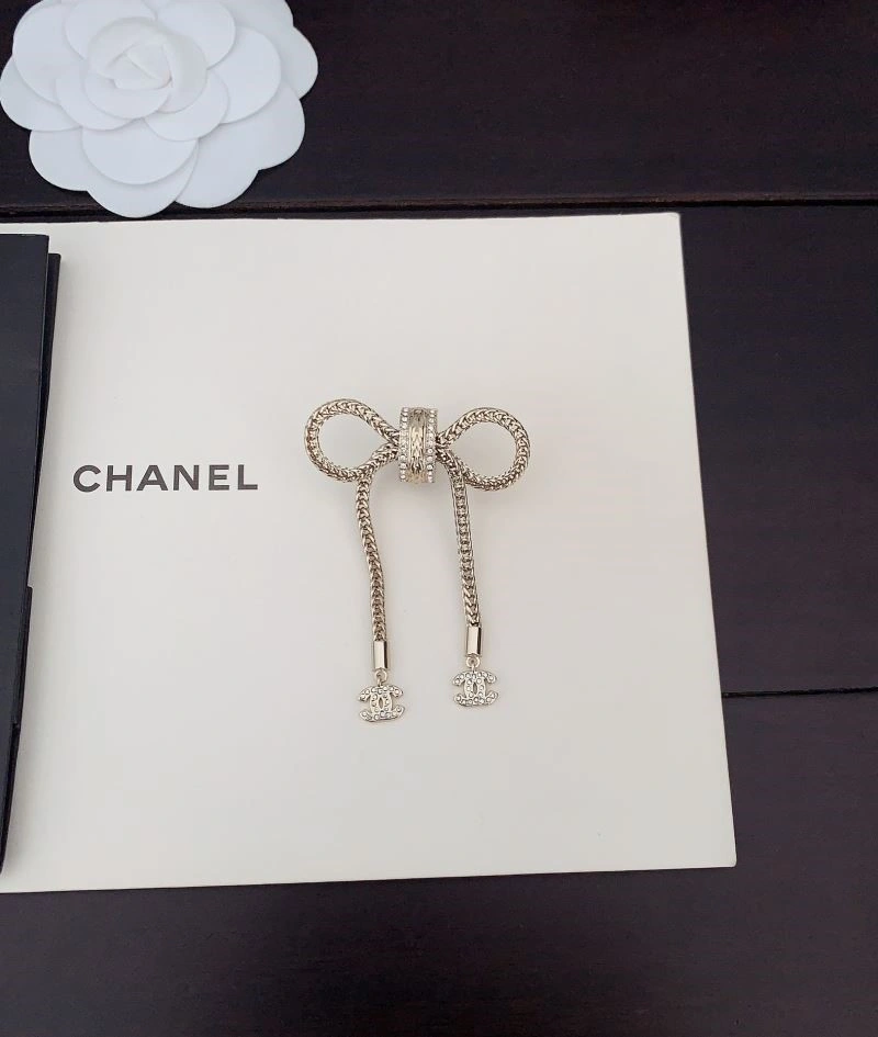 Cut-rate Chanel Brooches