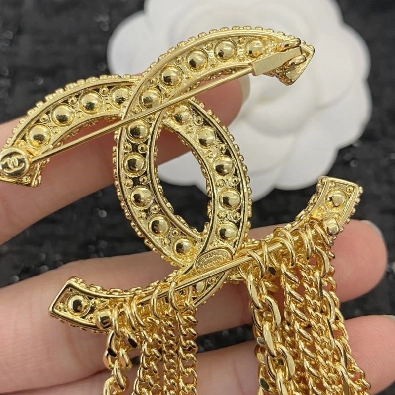 Indistinguishable Chanel Brooches