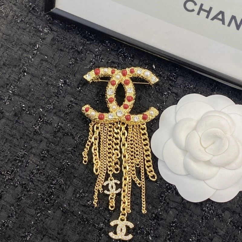 Indistinguishable Chanel Brooches