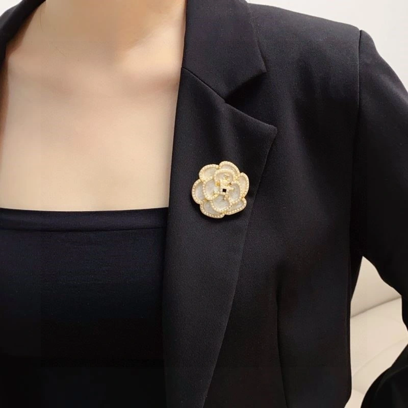 Indistinguishable Chanel Brooches