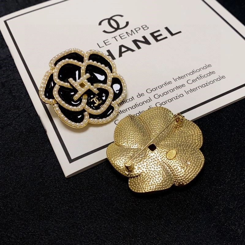 Indistinguishable Chanel Brooches