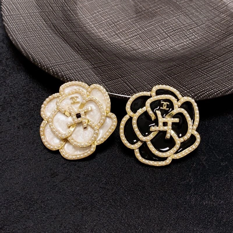 Indistinguishable Chanel Brooches