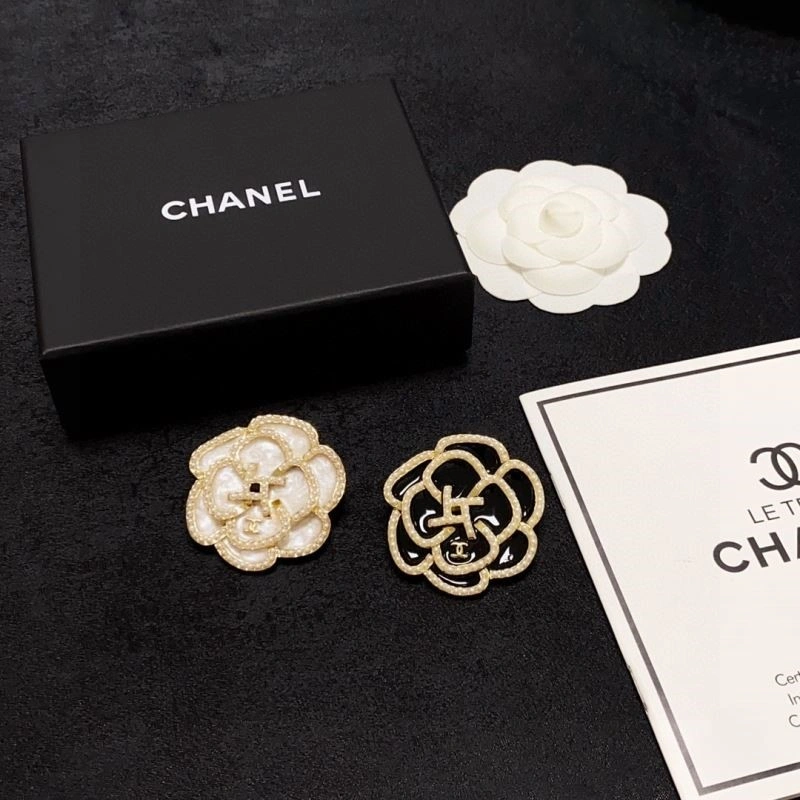 Indistinguishable Chanel Brooches