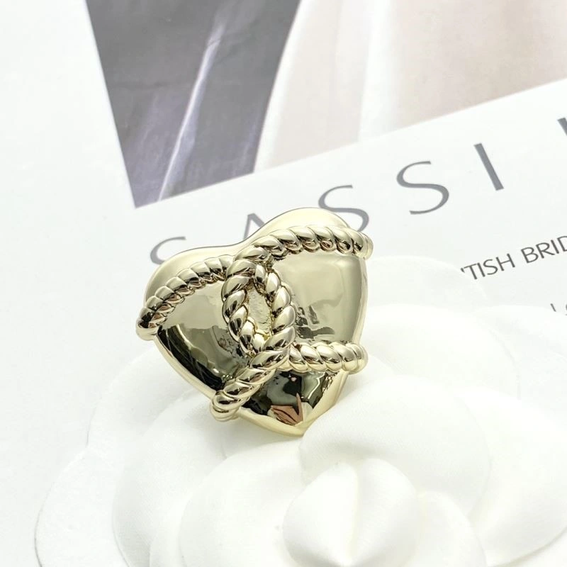 Indistinguishable Chanel Brooches