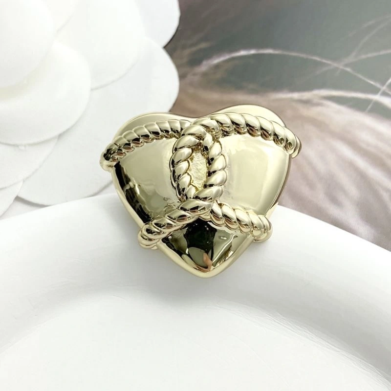 Indistinguishable Chanel Brooches